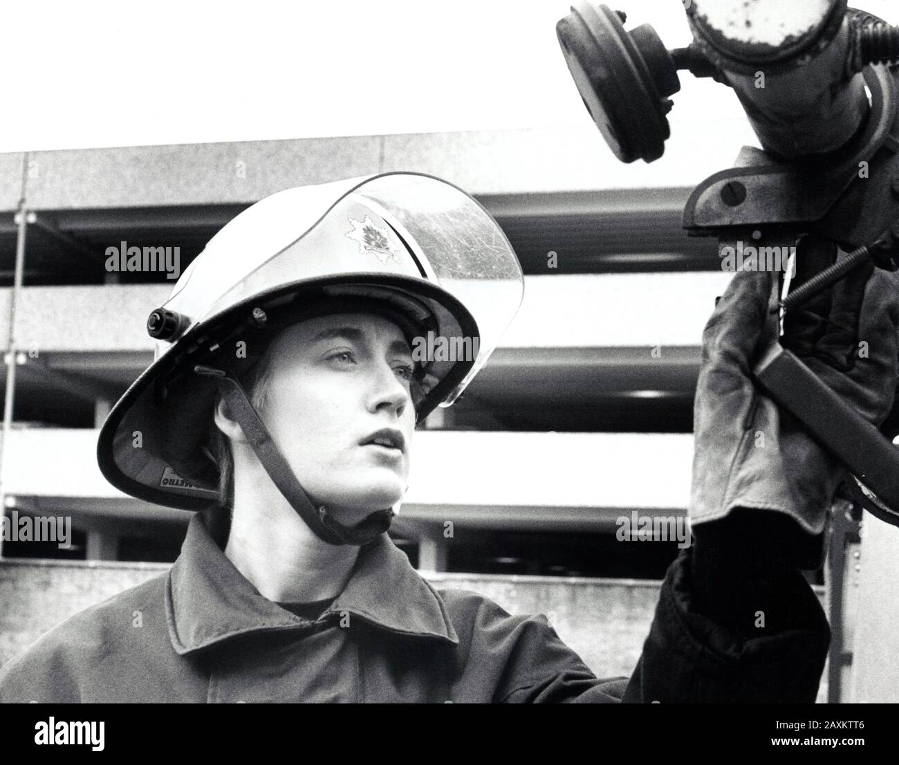 Female fire fighter, Beeston, UK 1980s Stock Photo - Alamy