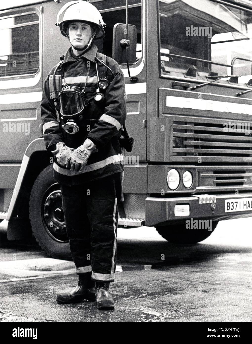 Female fire fighter, Beeston, UK 1980s Stock Photo - Alamy