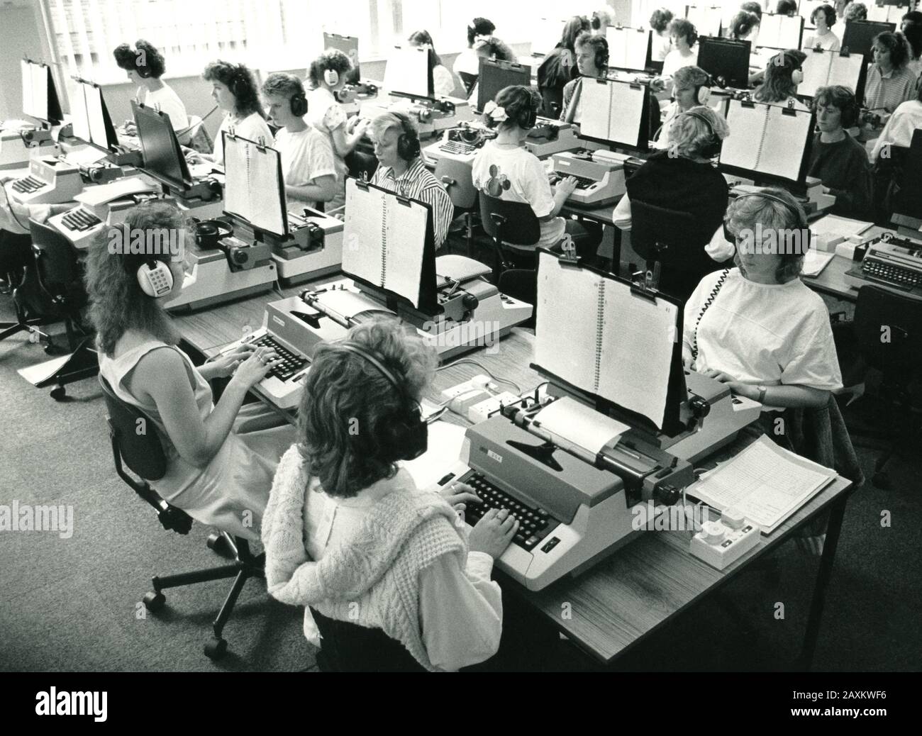 Women typing 1980s hi-res stock photography and images - Alamy