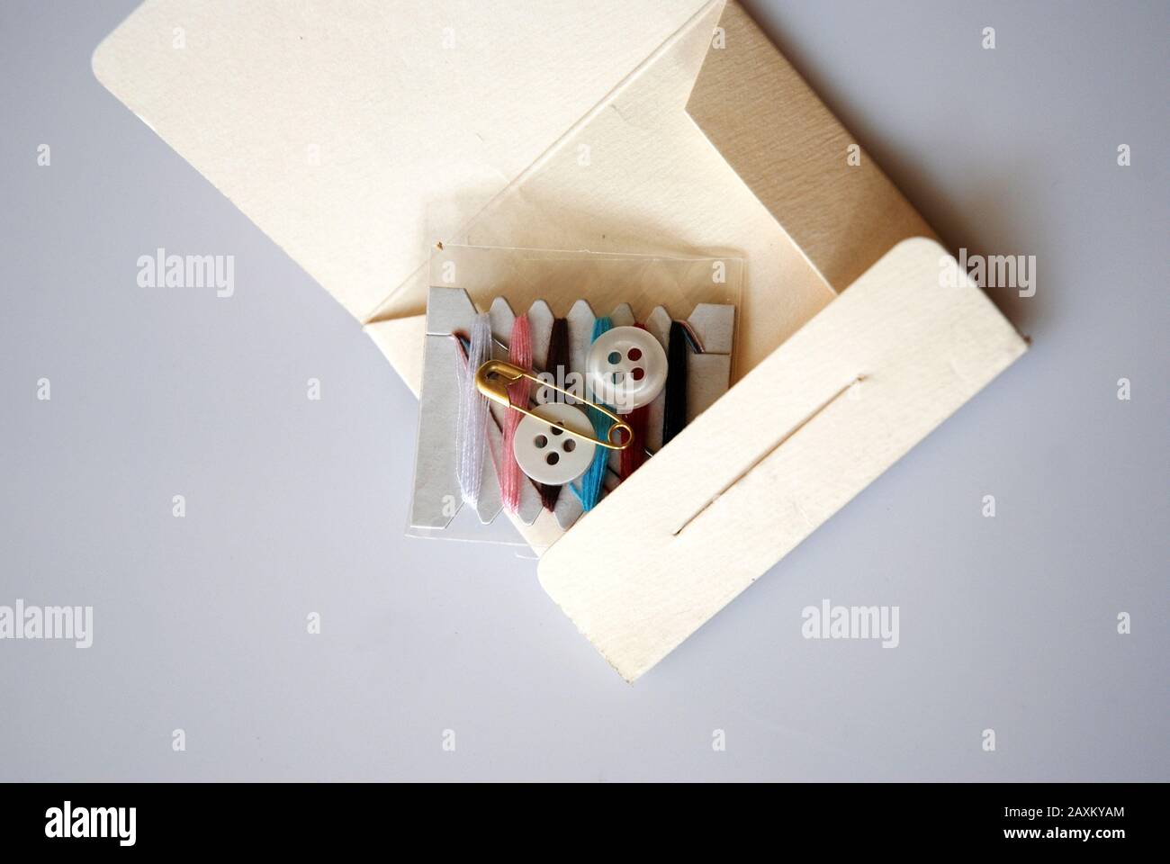 Sewing Kit for first Aid on grey background Stock Photo - Alamy