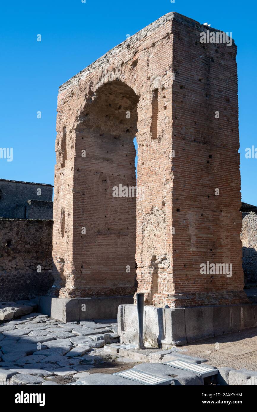Ancient arch at Pompeii Archaeological Site near Naples, Italy Stock ...