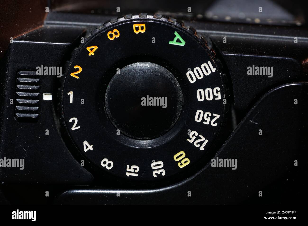 Setting wheel for ISO and aperture on an old camera photographed in the ...