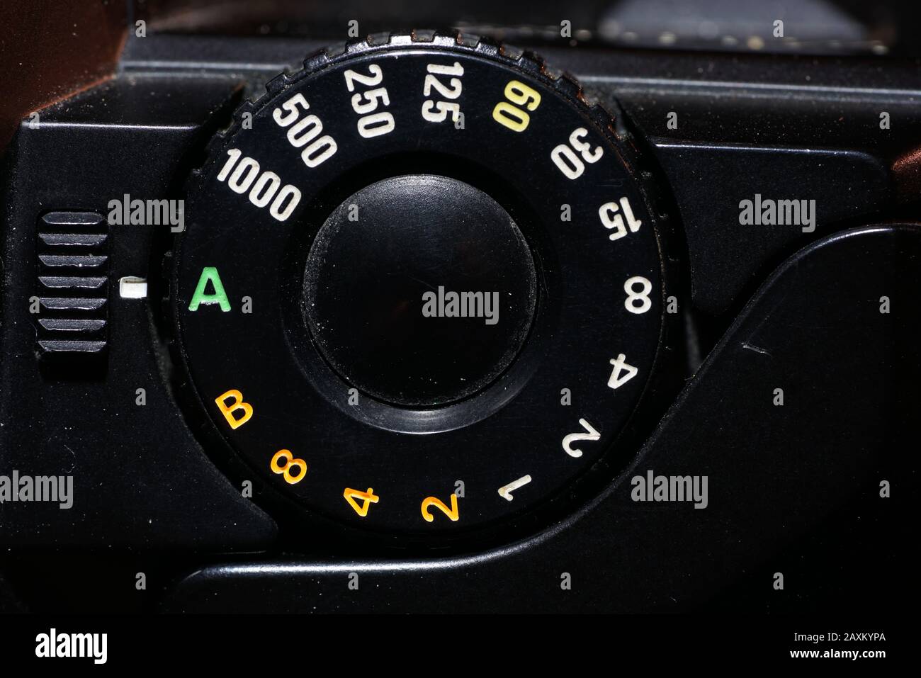 Setting wheel for ISO and aperture on an old camera photographed in the ...
