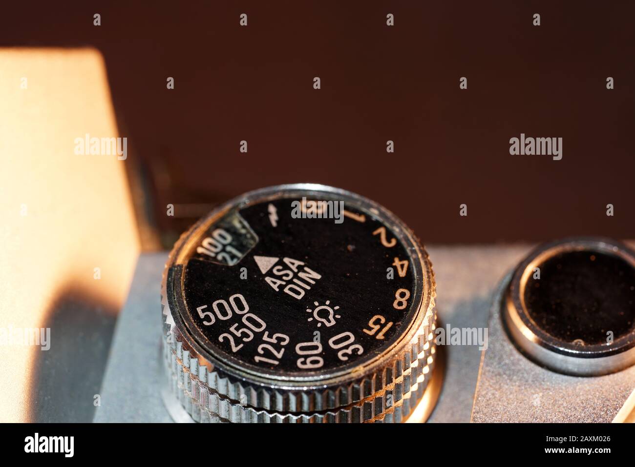 Setting wheel for ISO and aperture on an old camera photographed in the ...