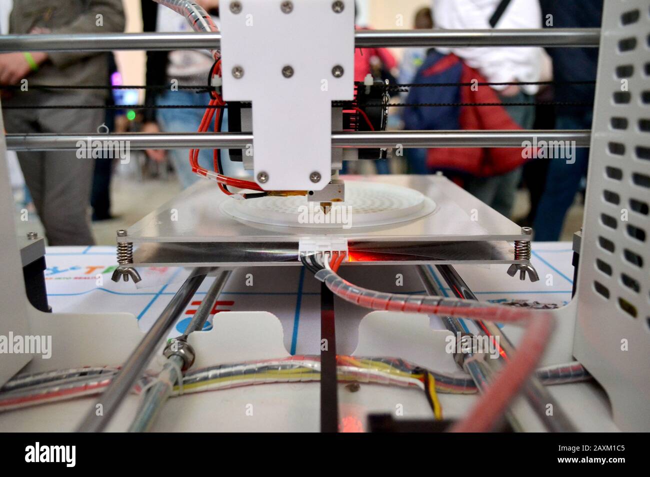 The process of working 3D printer and creating a three-dimensional object. Progressive modern ...