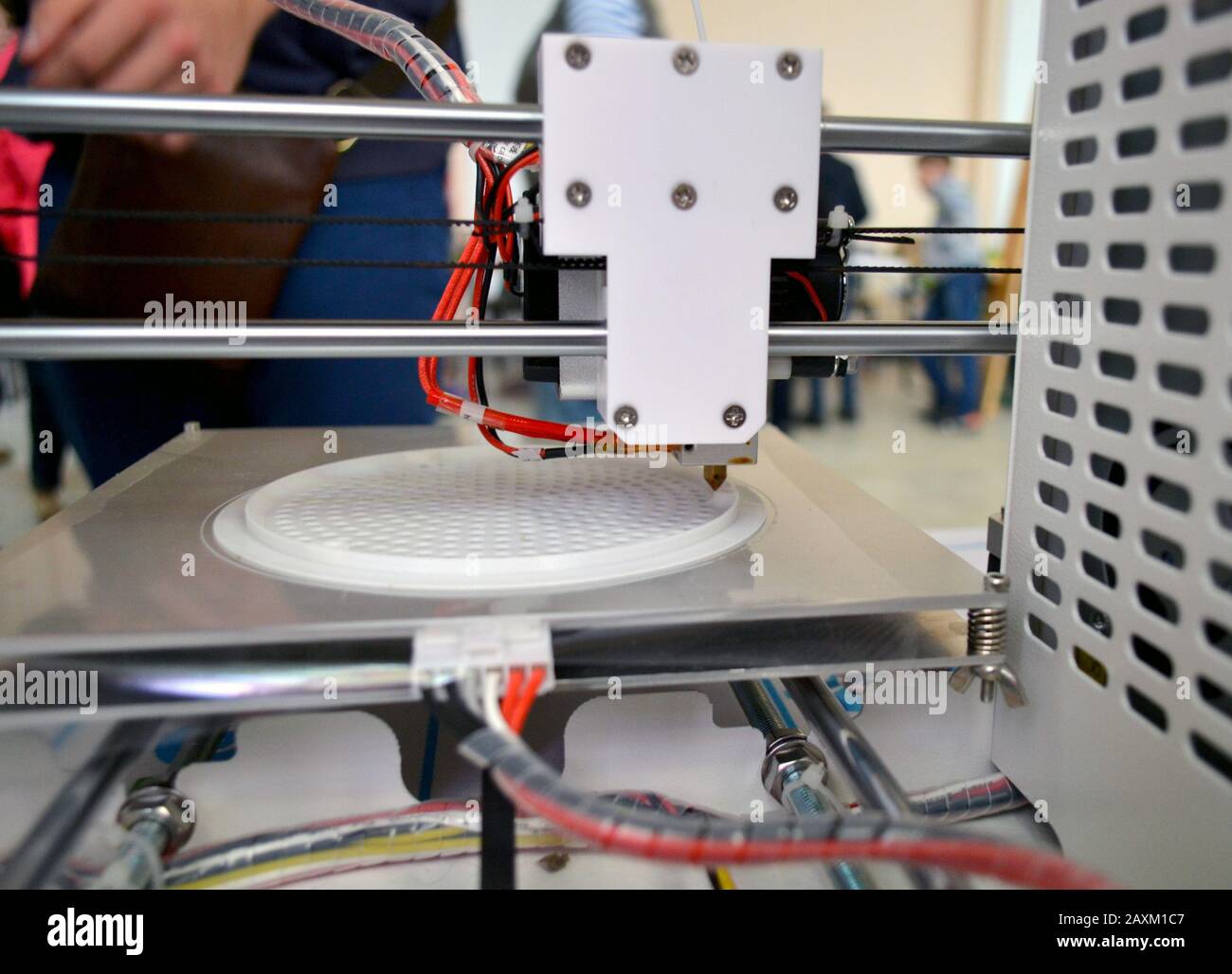 The process of working 3D printer and creating a three-dimensional object. Progressive modern ...