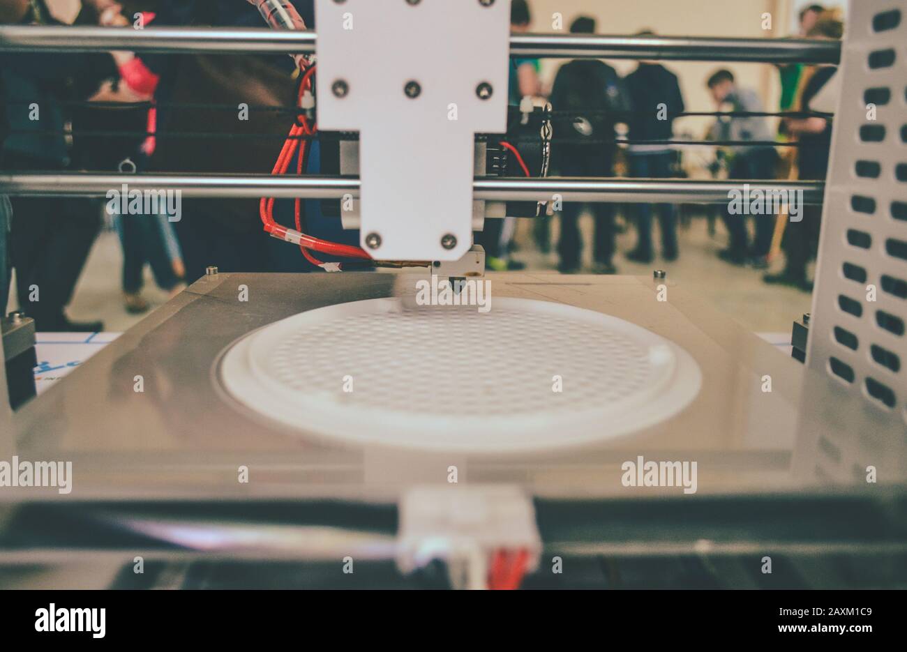 The process of working 3D printer and creating a three-dimensional object. Progressive modern ...