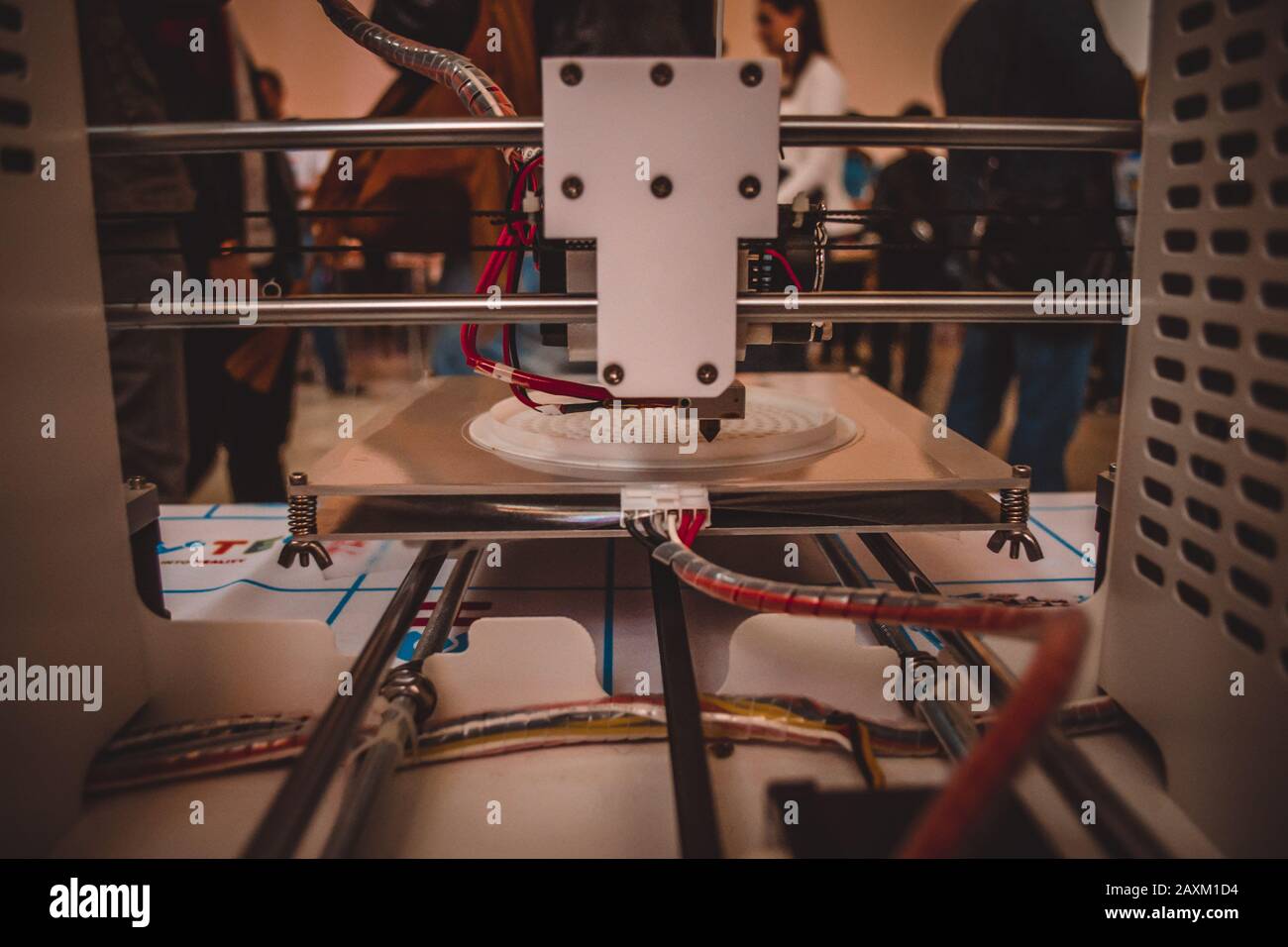 The process of working 3D printer and creating a three-dimensional object. Progressive modern ...