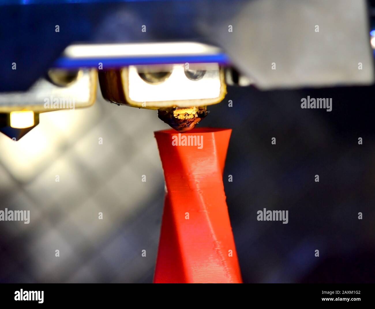 Modern 3D printer printing figure close-up macro. Automatic three ...