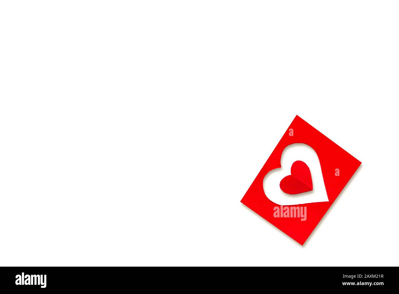 Paper made red cute heart shape label isolated on white background with ...