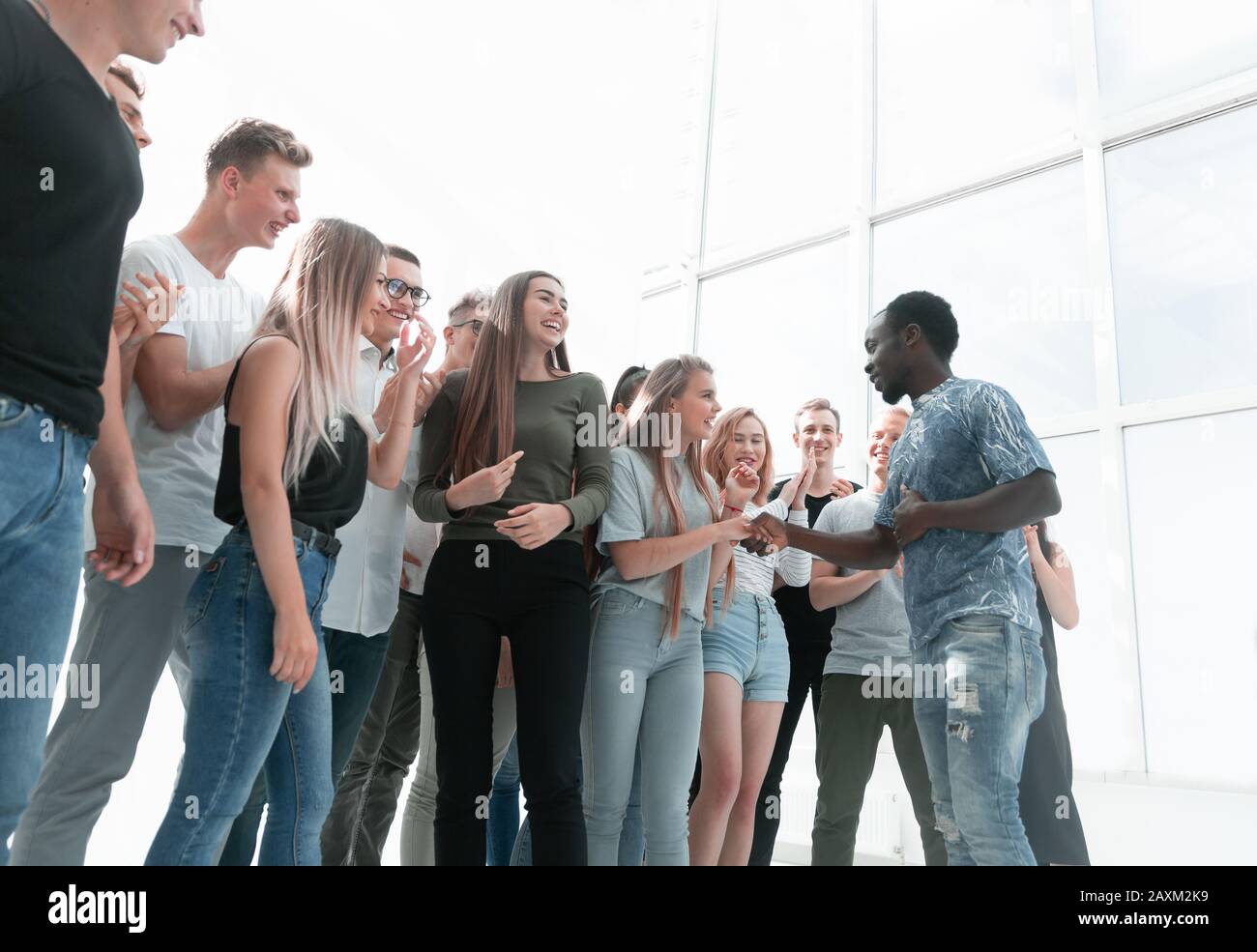 Students Greeting Each Other High Resolution Stock Photography and ...
