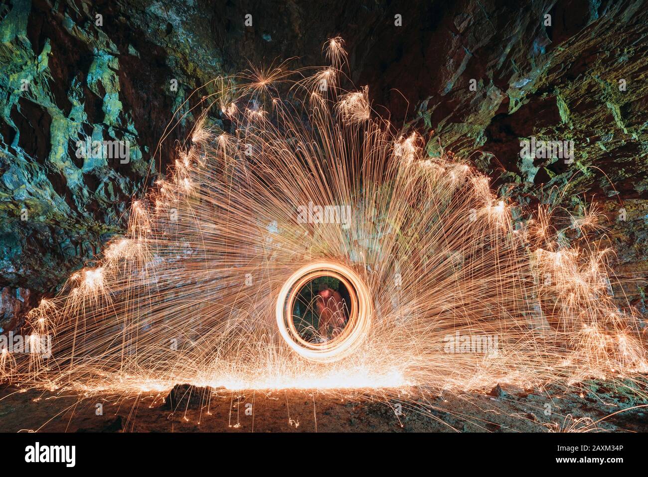 The cave highlighted by burning metallic wool. Light graphics inside ...