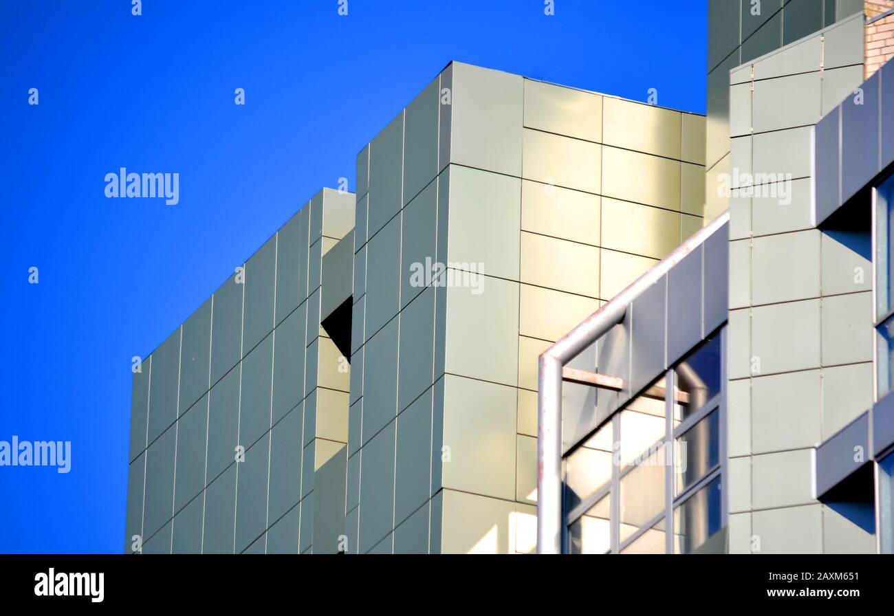 gray walls of a modern building and clear sky Stock Photo - Alamy