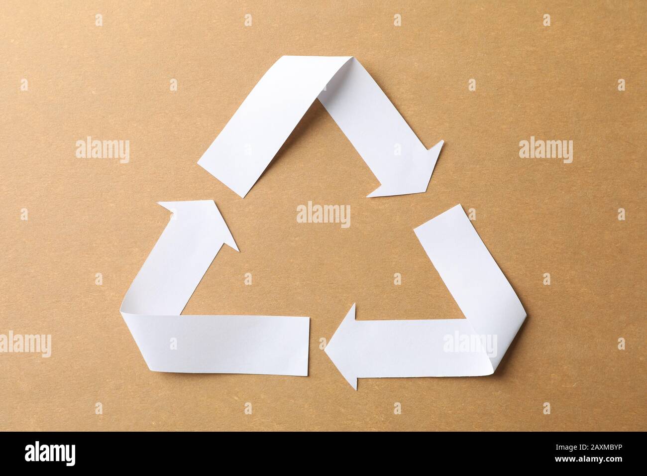 Recycling sign on craft background, top view Stock Photo - Alamy