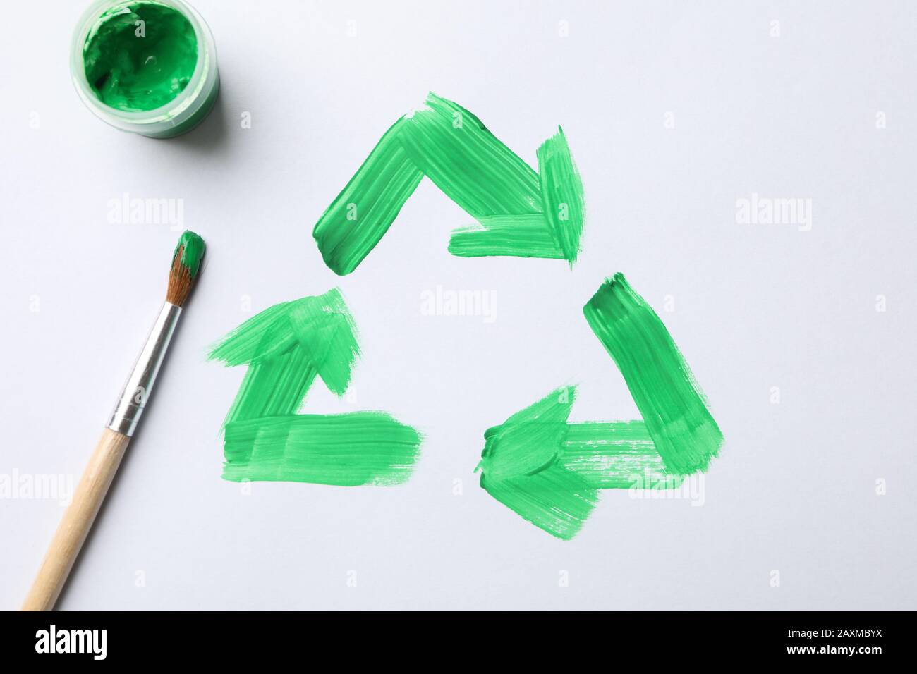 Drawn recycling sign on white background, top view Stock Photo - Alamy
