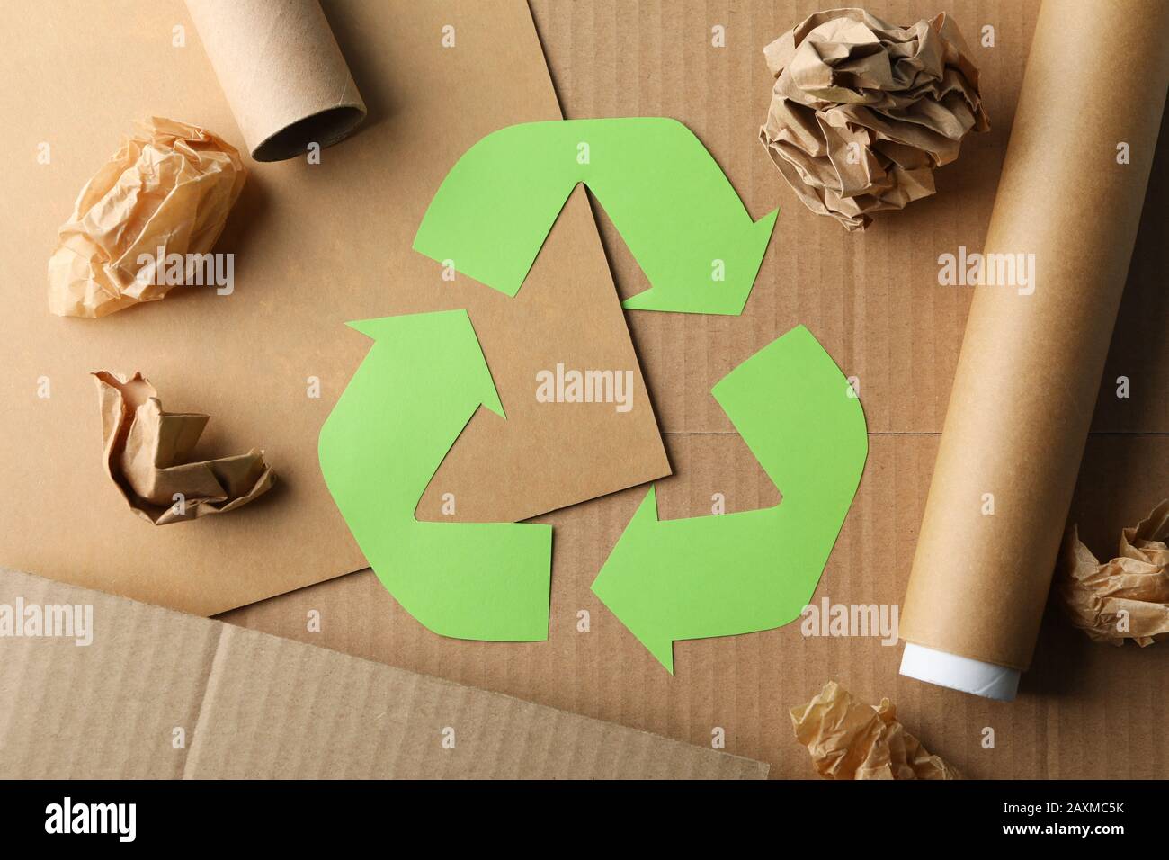 Recycle sign on craft background with craft paper, top view Stock Photo ...
