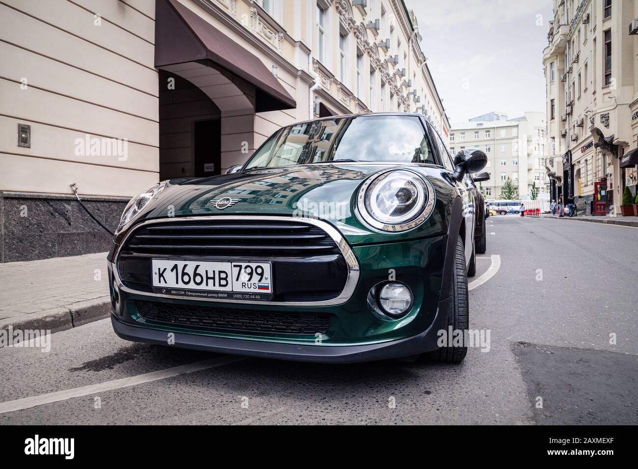 Russia Moscow 2019-06-17 Green car Mini Cooper is parked on a street of ...