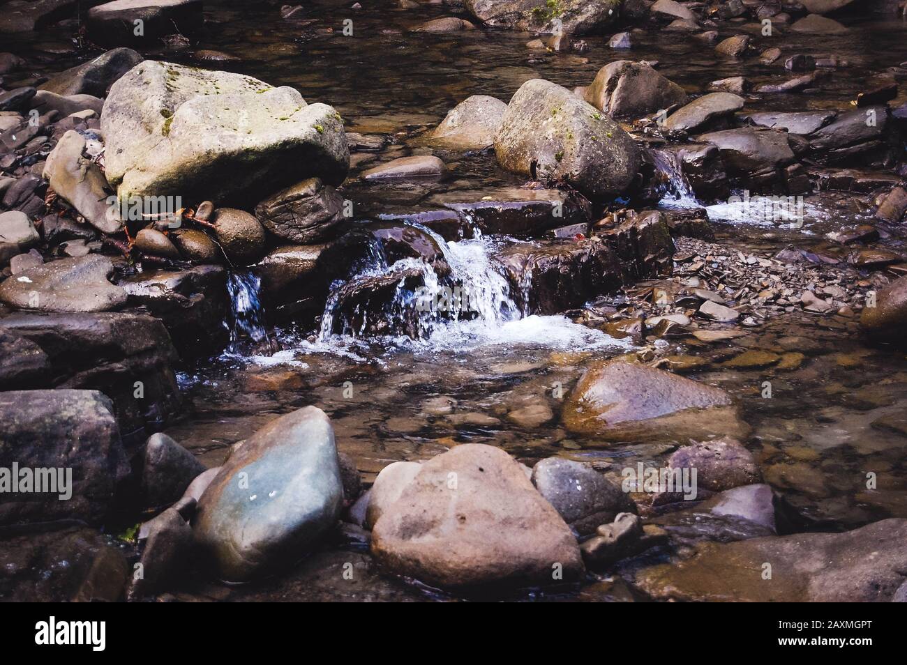 Crystal clear rocky river in hi-res stock photography and images - Alamy