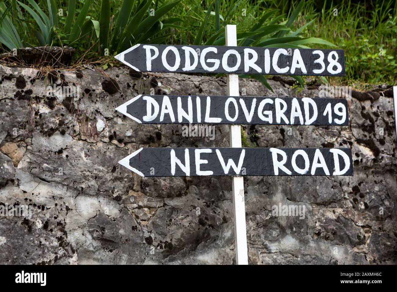 Roadsign with directions to Podgorica, Danilovgrad and new road to the ...