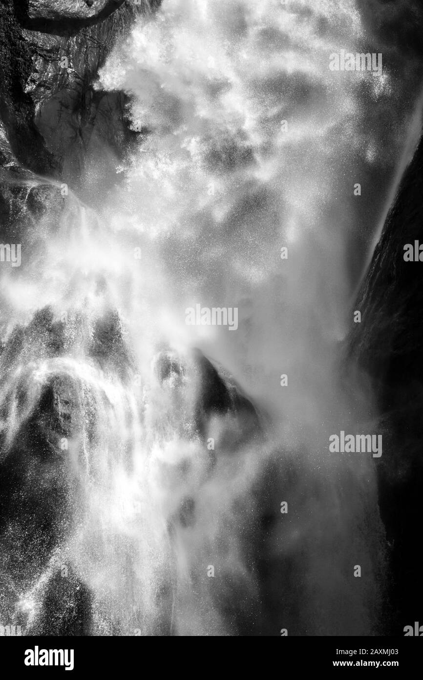 Falling water, abstract nature white and black background. Waterfall in ...