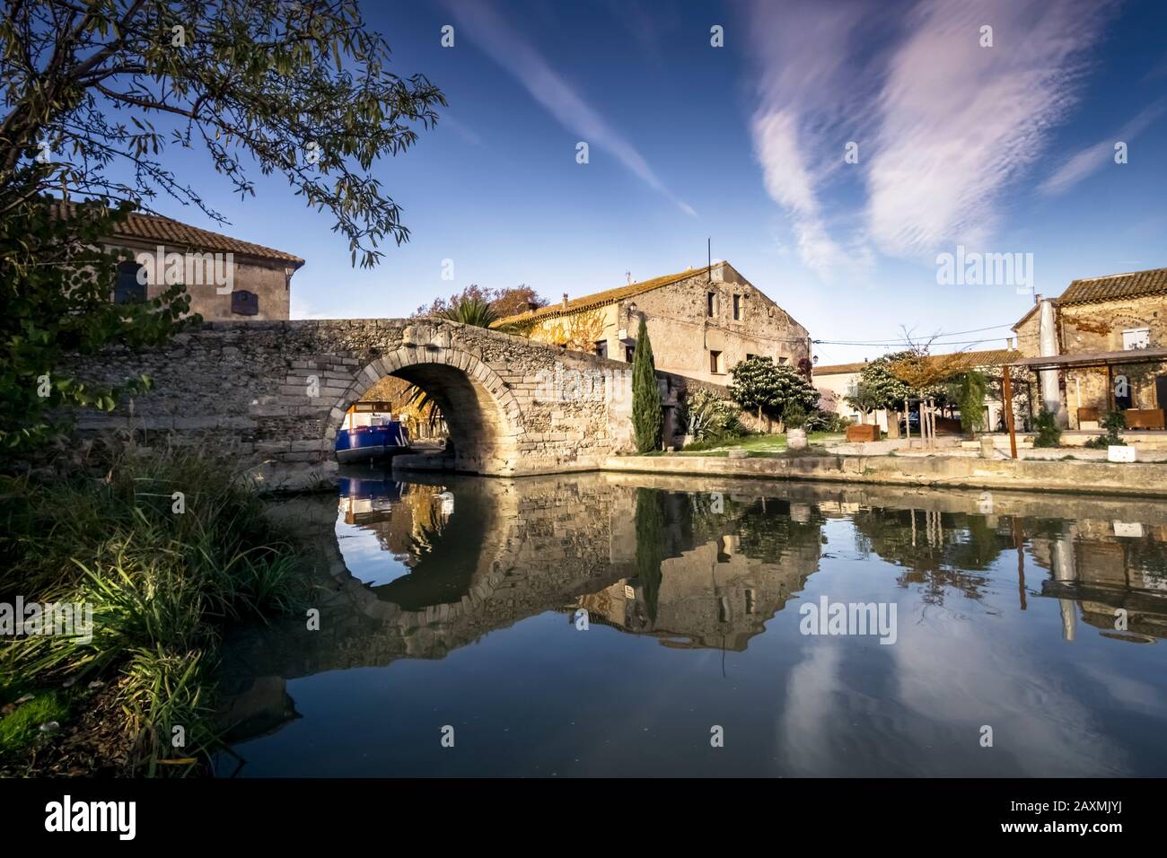 Old bridge about the Canal du Midi in Le Somail in autumn. Monuments ...