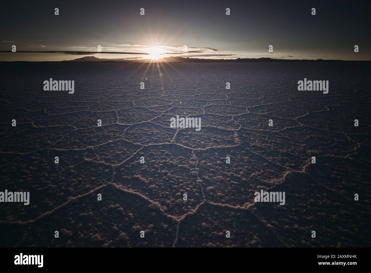 Irregular structures of salt at sunrise Stock Photo - Alamy