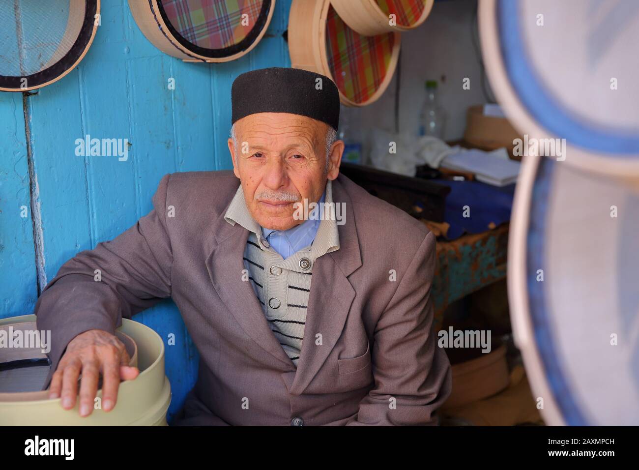 SFAX, TUNISIA - DECEMBER 25, 2019: Portrait of a local craftsman. He is ...