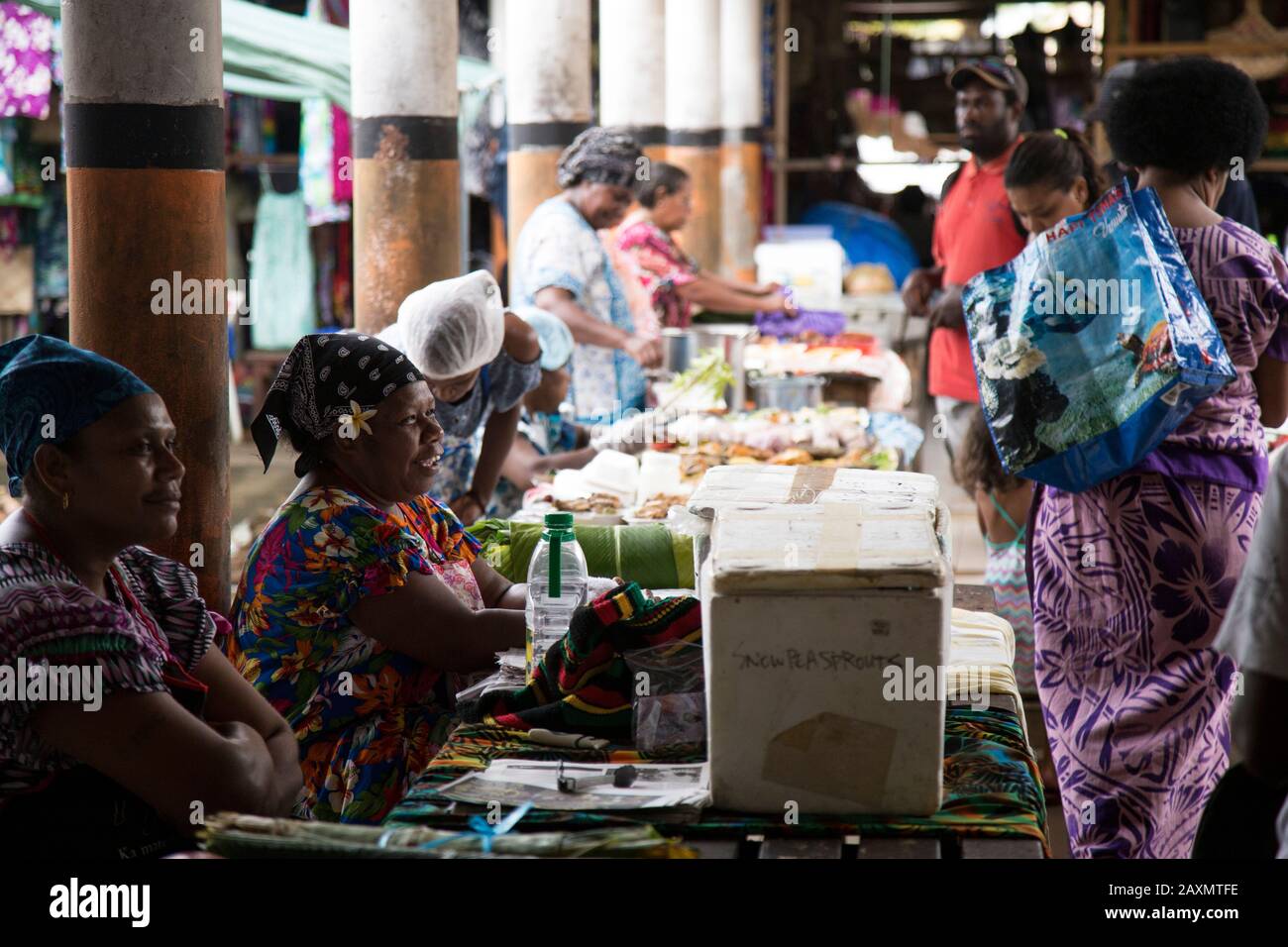 Vanuatu people (mostly woman) shopping at local fish market, Port Vila ...
