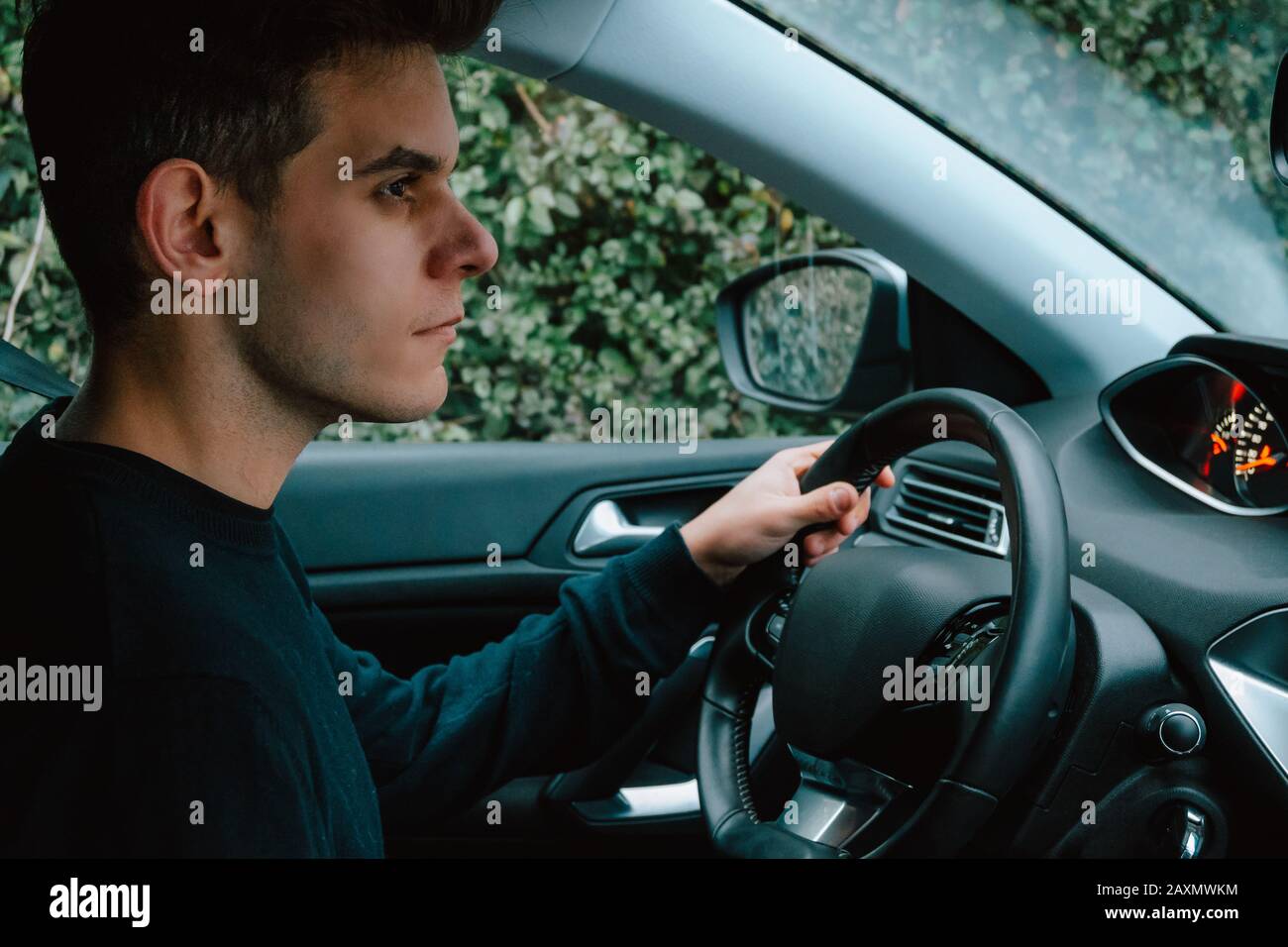 Male driving car concentrated hi-res stock photography and images - Alamy