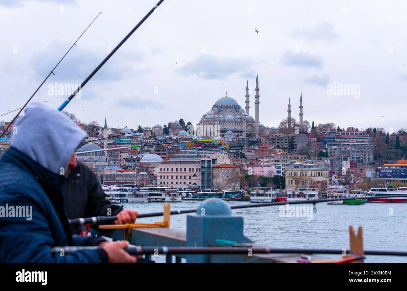 ISTANBUL - DEC 29: Fishermen at the Galata Bridge, Fisherman fishing in ...