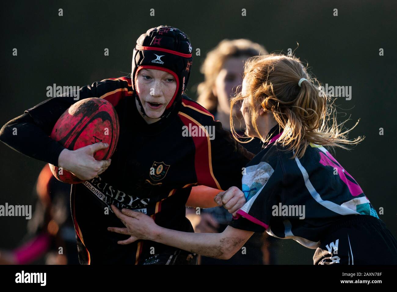 Girls playing rugby hi-res stock photography and images - Alamy