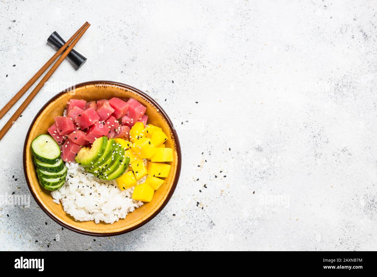 Tuna poke bowl with rice and vegetables Stock Photo - Alamy