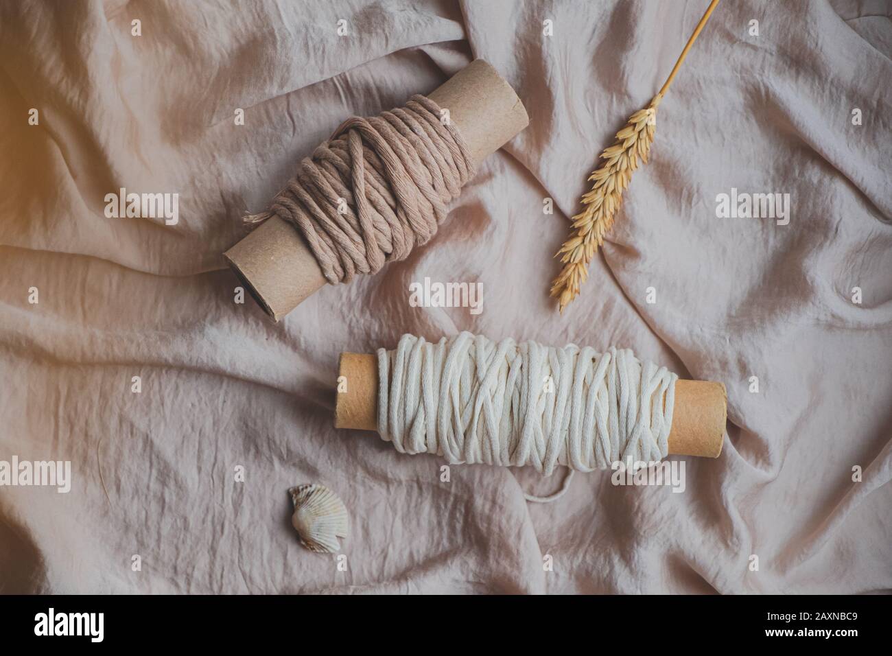 Macrame ropes in pastel colors, top view. Crochet threads in beautiful ...