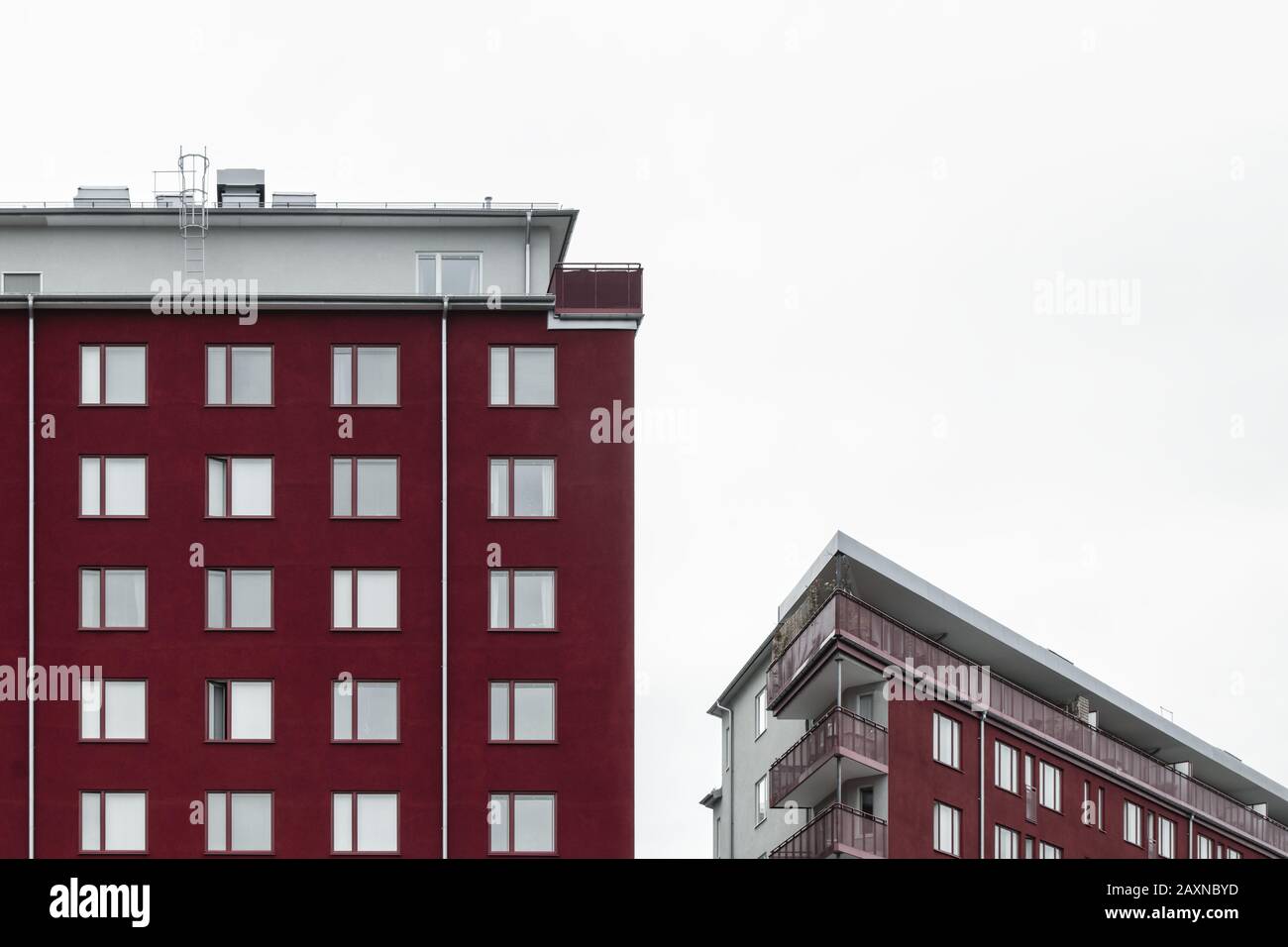 Modern cherry red buildings against cloudy sky. Stockholm, Sweden Stock ...