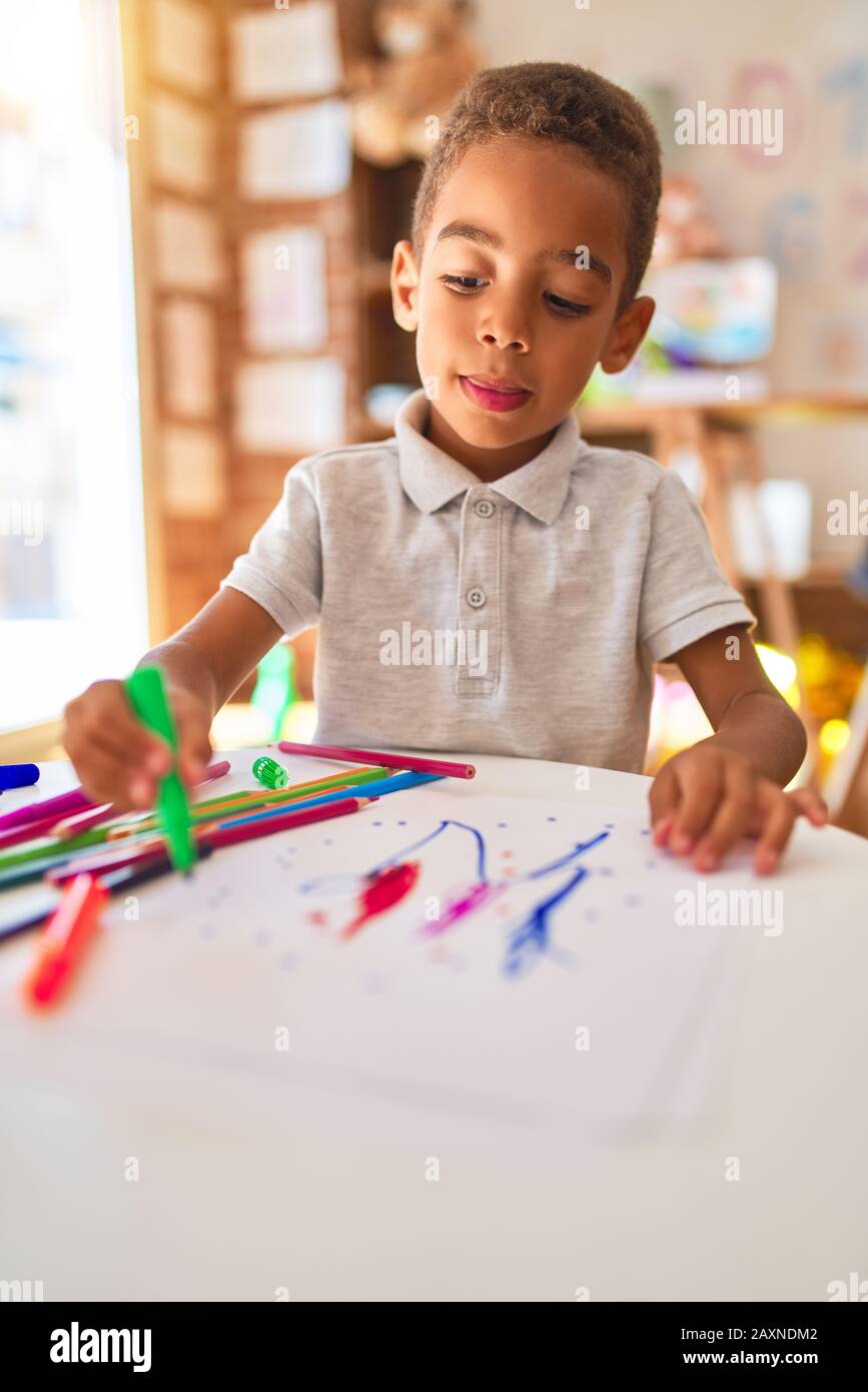 African american boy coloring marker hi-res stock photography and ...