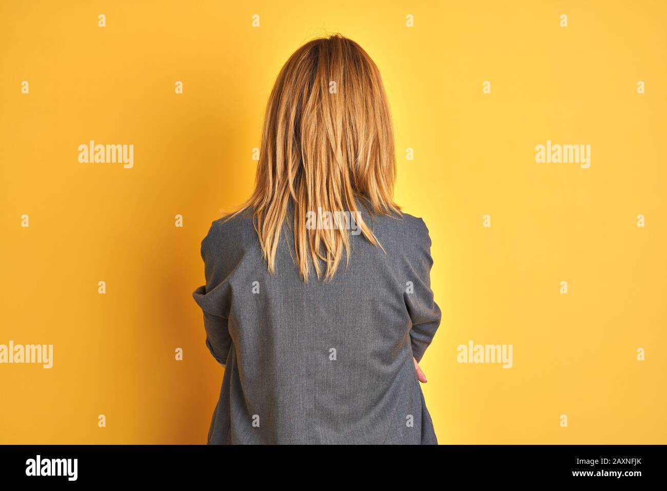 Redhead Caucasian Business Woman Over Yellow Isolated Background