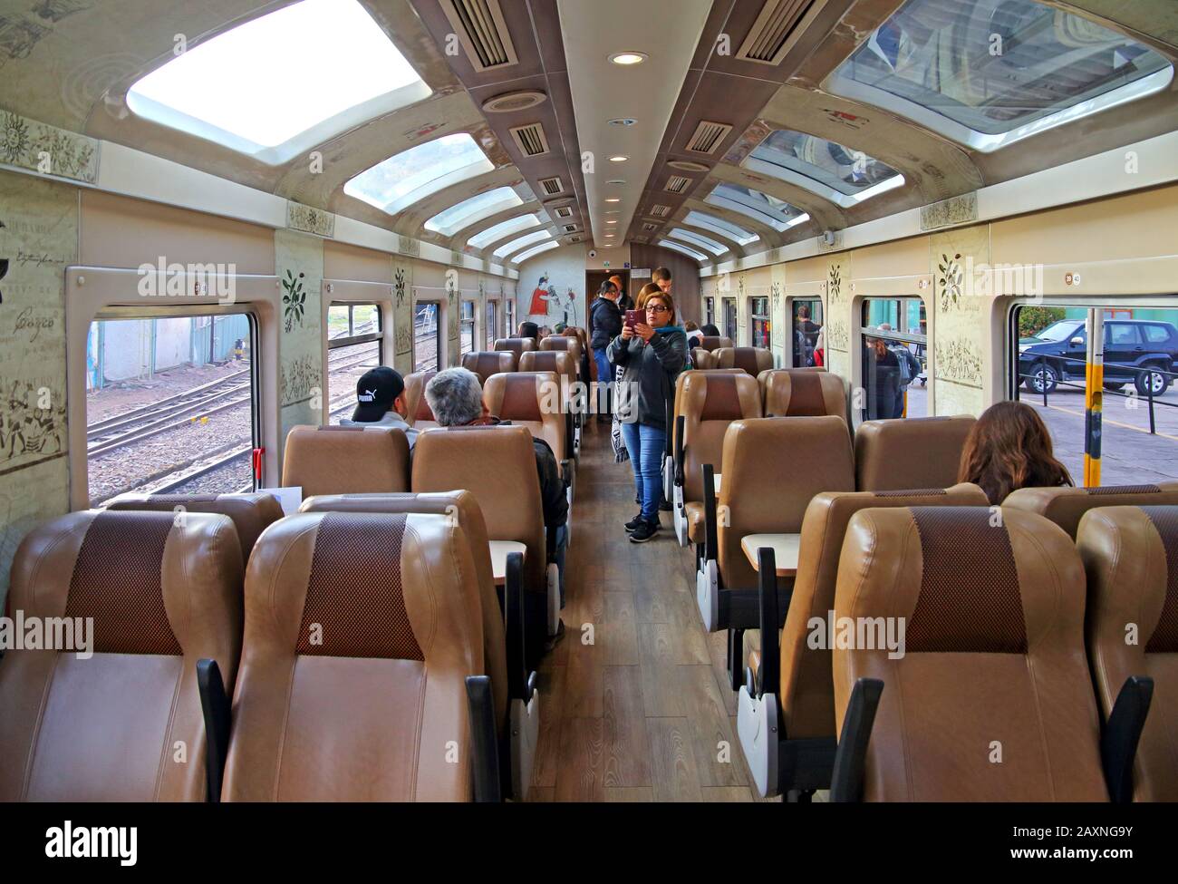 Inside a carriage of the expedition train to Machu Picchu, Andes ...