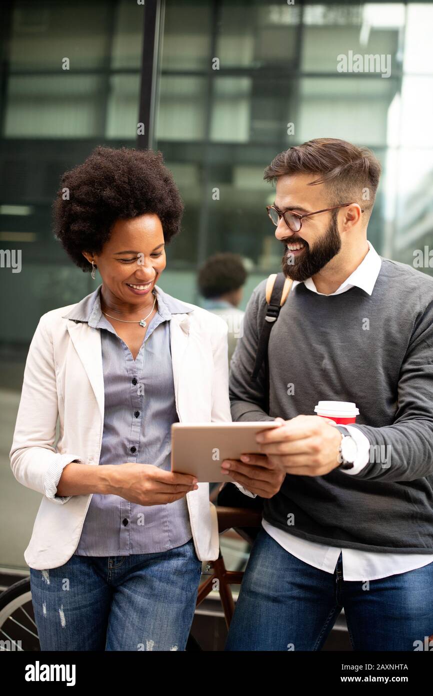Happy business people, students having fun, smiling, talking in the ...