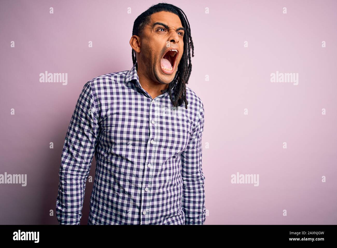 Portrait screaming upset young afro hi-res stock photography and images ...