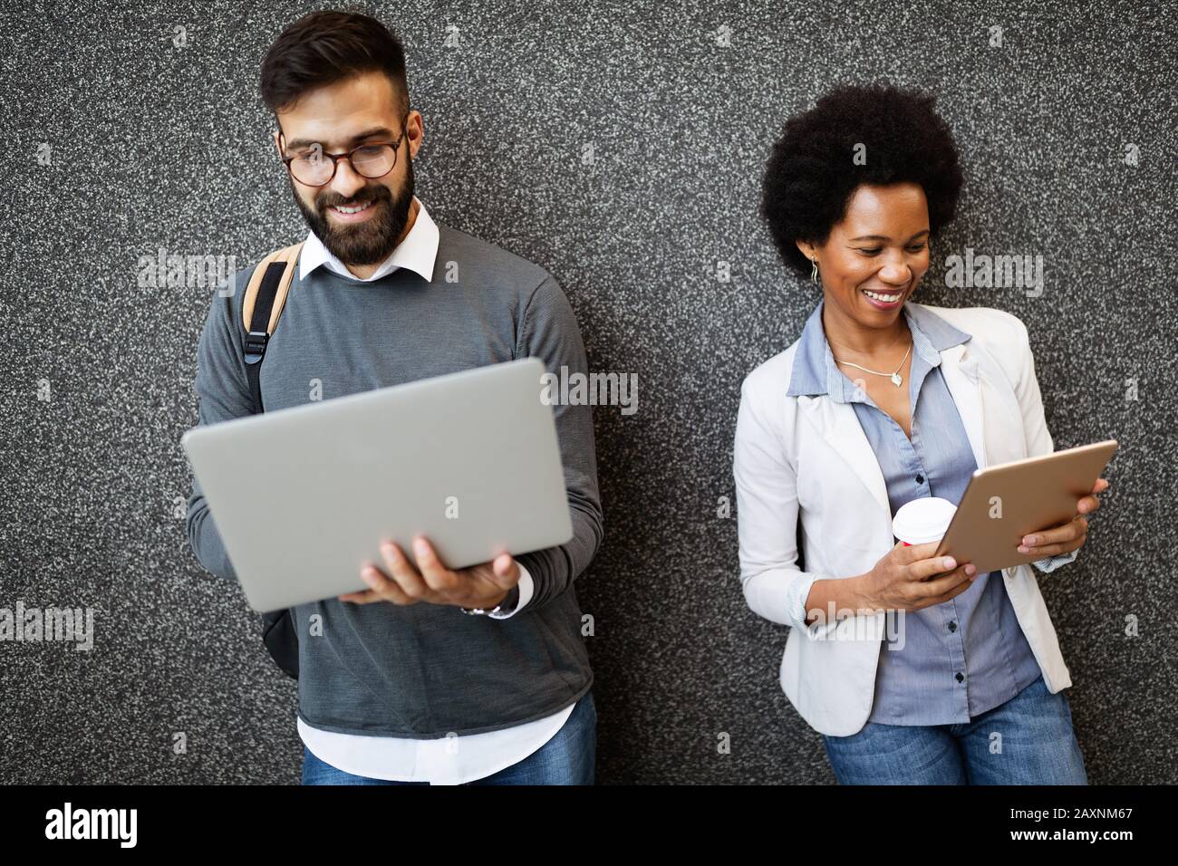 People using technology hi-res stock photography and images - Alamy
