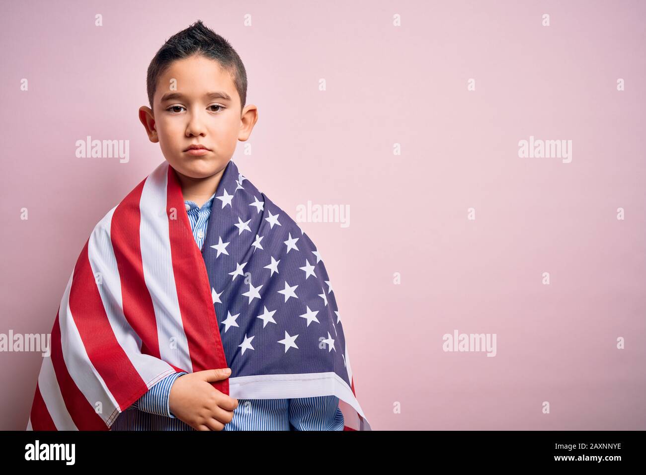 Young little patriotic boy kid covered on united states of america flag ...