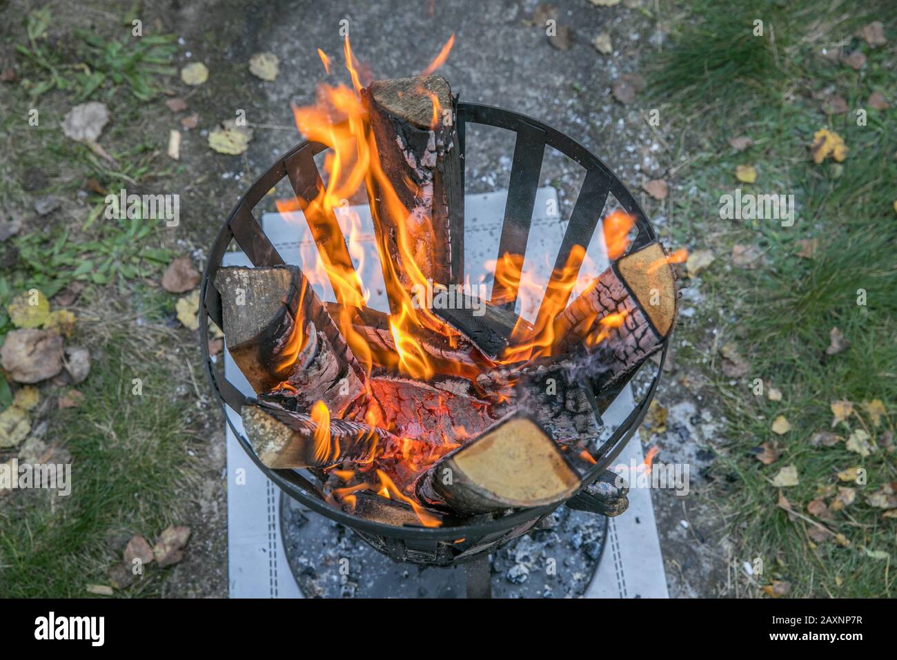 Fireplace in a metal hearth Stock Photo - Alamy