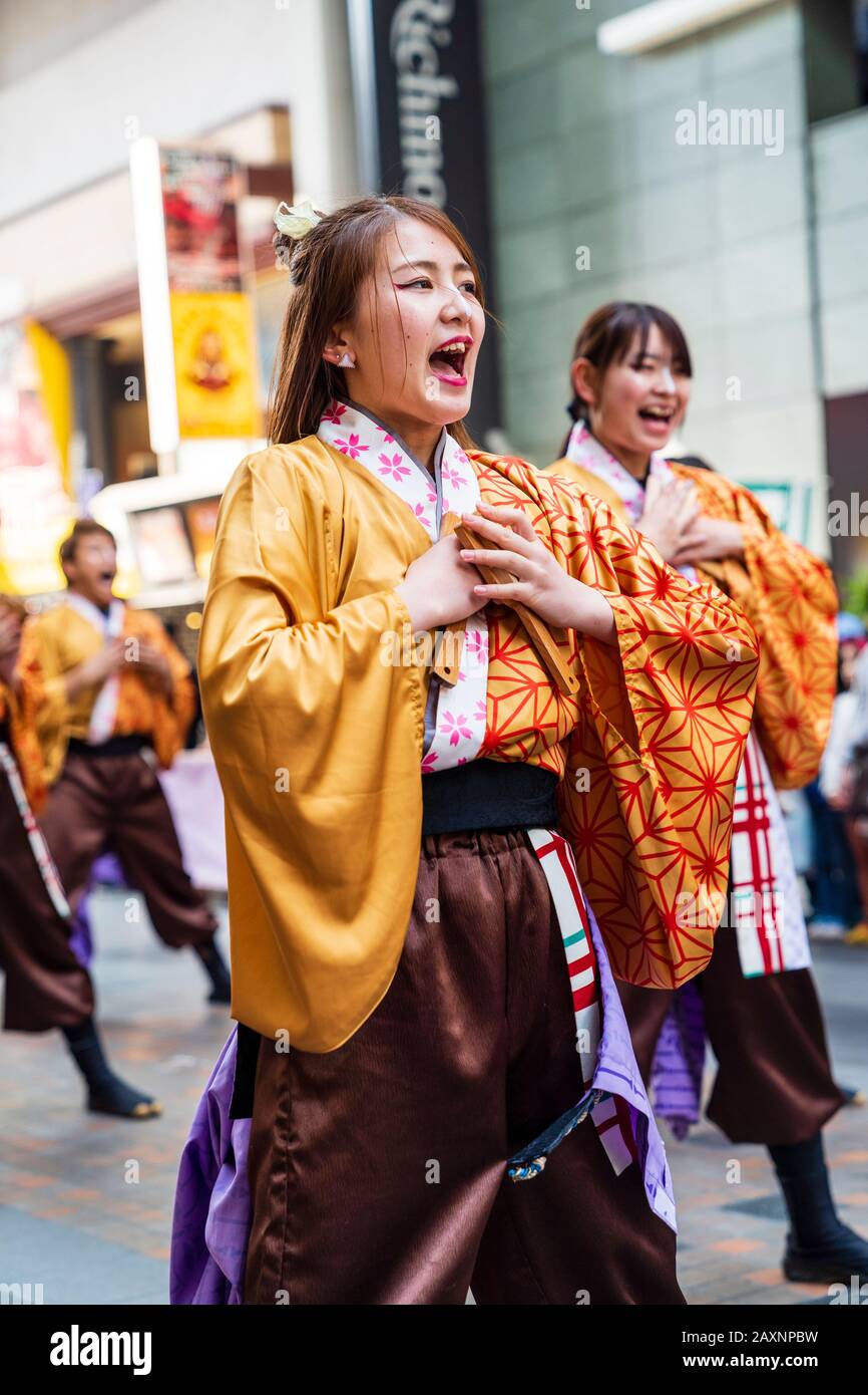 Close up, Japanese young woman holding naruko, clappers, in Yosakoi ...