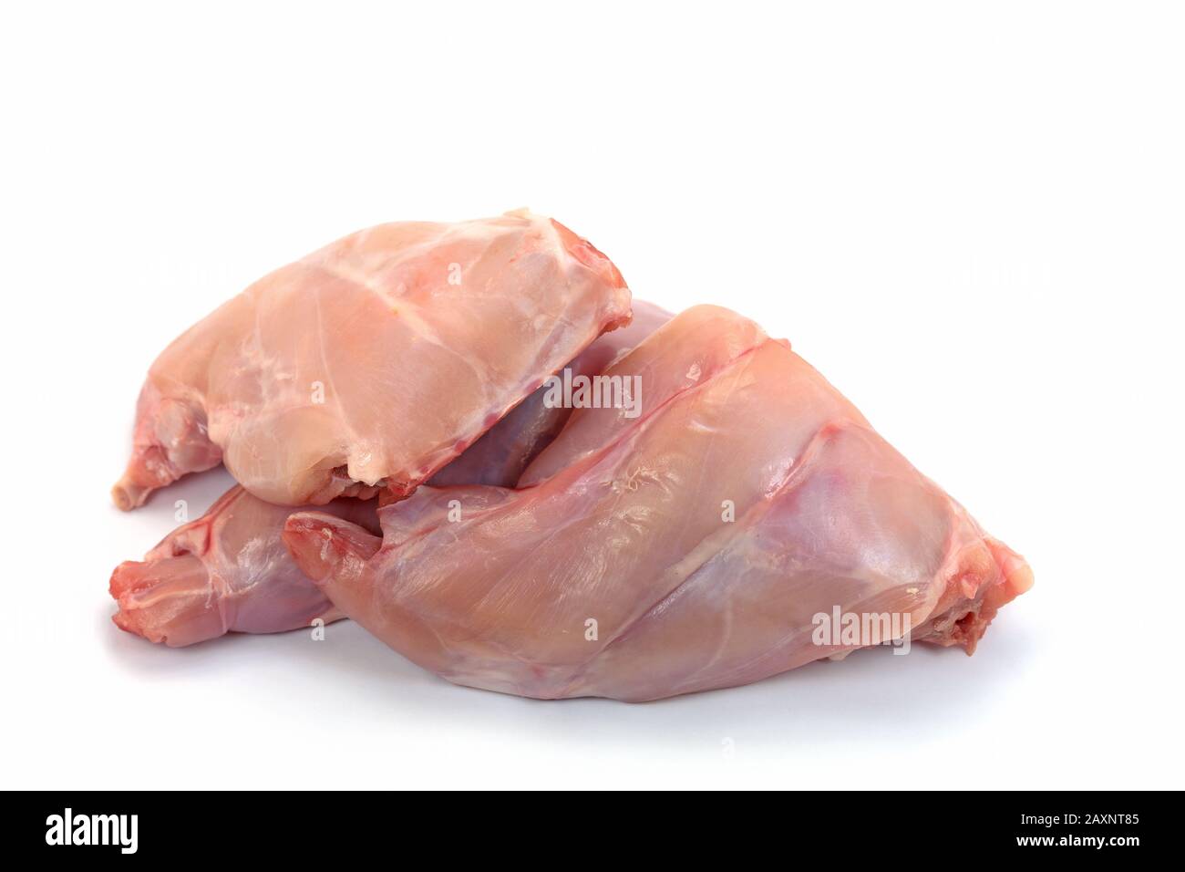 Rabbit thigh against white background Stock Photo - Alamy