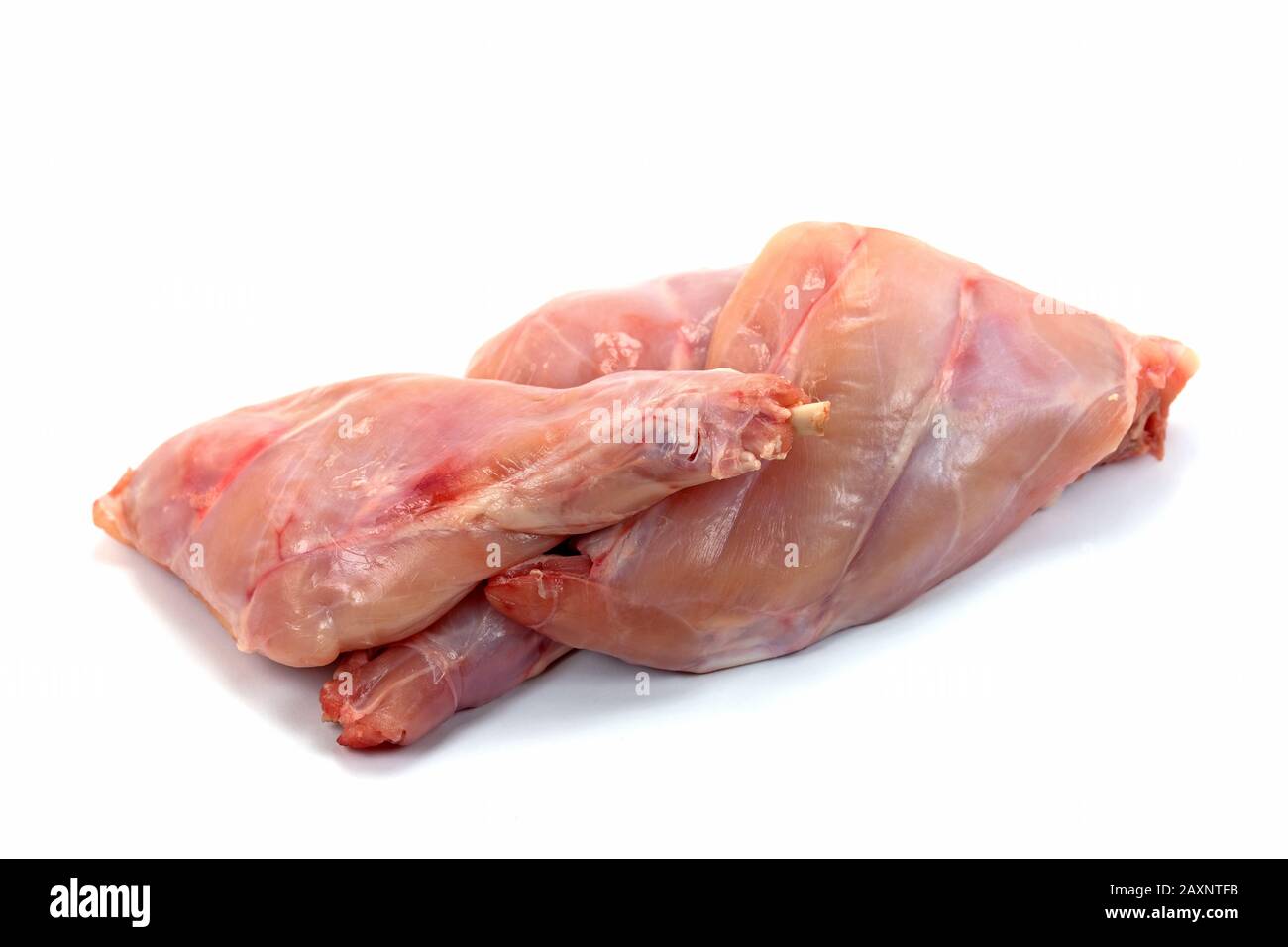 Rabbit thigh against white background Stock Photo - Alamy