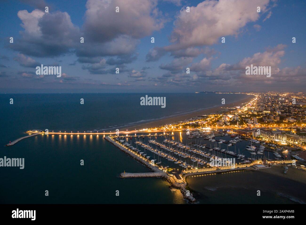 drone aerial view of rimini sea beach and harbour at twilight and dawn ...