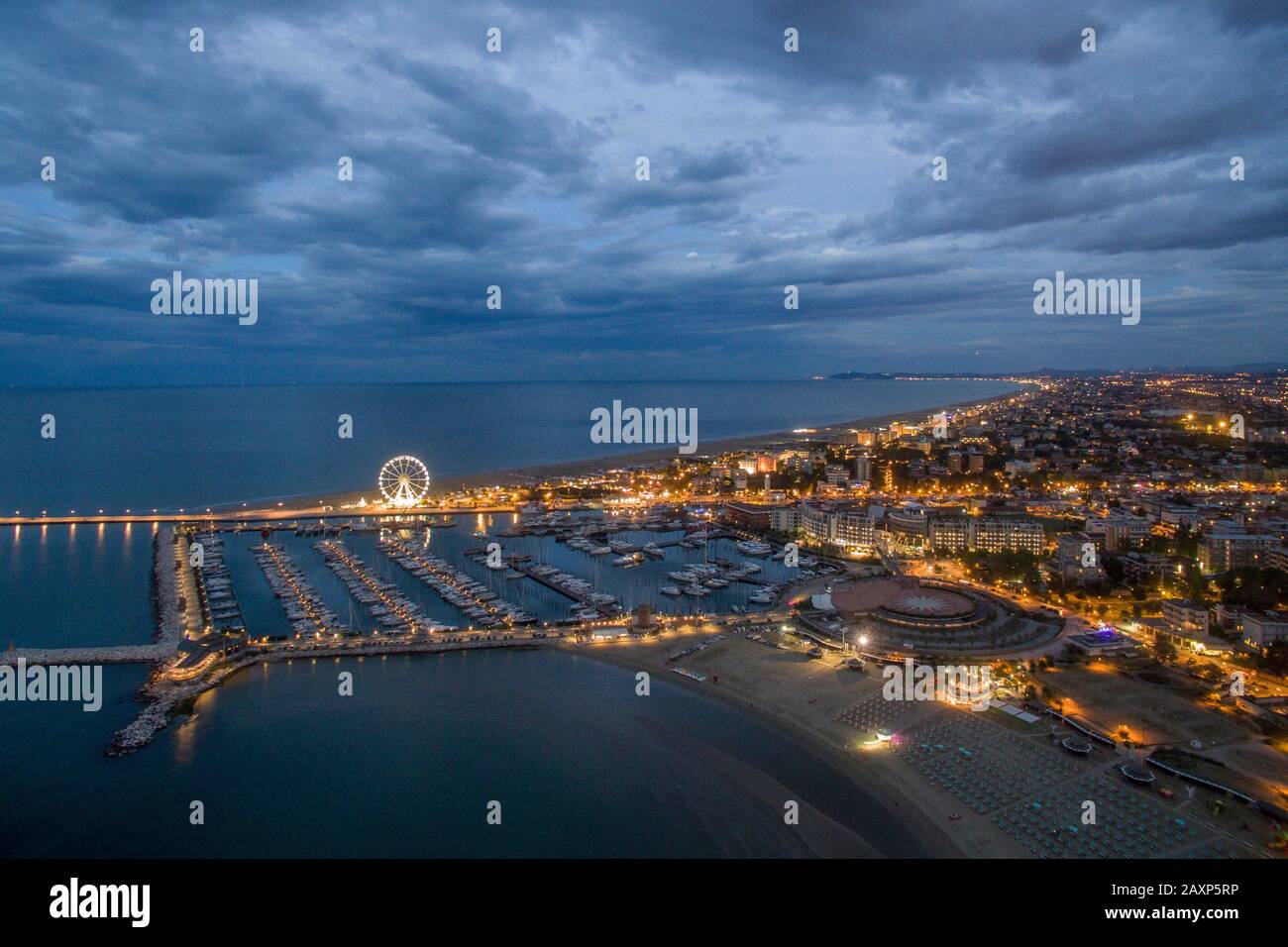 drone aerial view of rimini sea beach and harbour at twilight and dawn ...