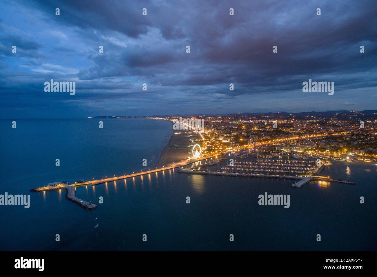 drone aerial view of rimini sea beach and harbour at twilight and dawn ...