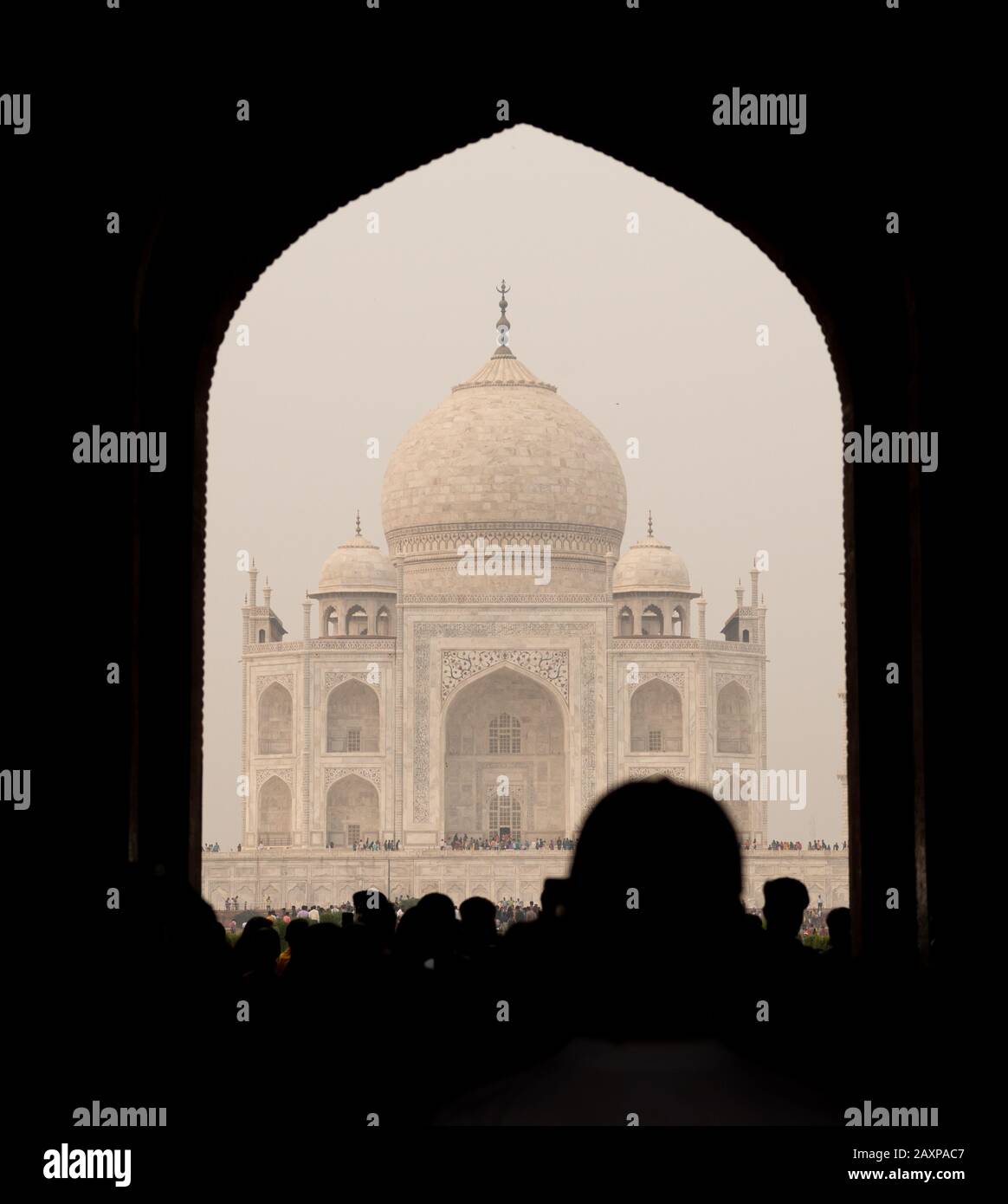 Visitors and tourist crowd the grounds of the TAJ MAHAL in Agra, India ...