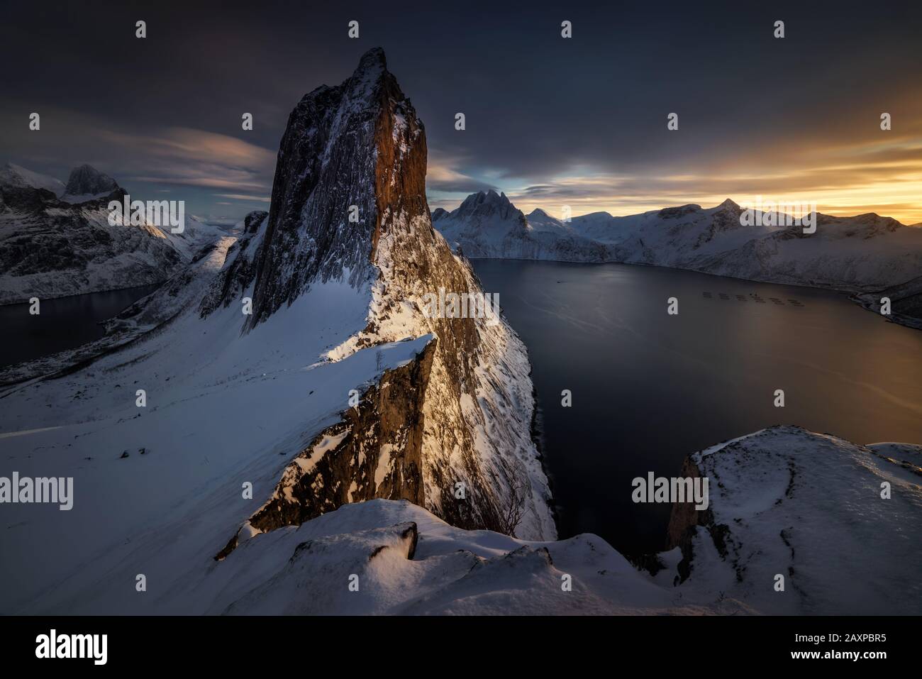 Segla summit and Mefjorden in winter sunset, Senja, Norway Stock Photo ...